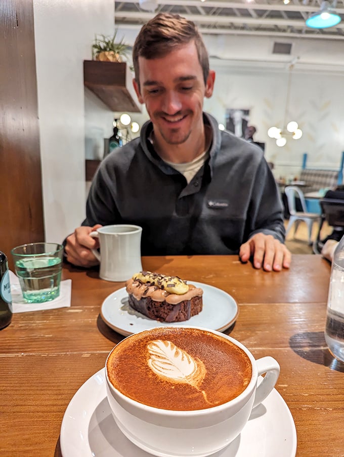 The joy of breakfast is written all over this scene&mdash;a perfect latte, a decadent pastry, and the anticipation of that first heavenly bite.