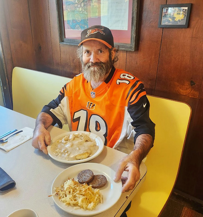 A Cincinnati Bengals fan enjoying the breakfast that fuels Ohio's football enthusiasm. Some traditions are sacred for good reason.