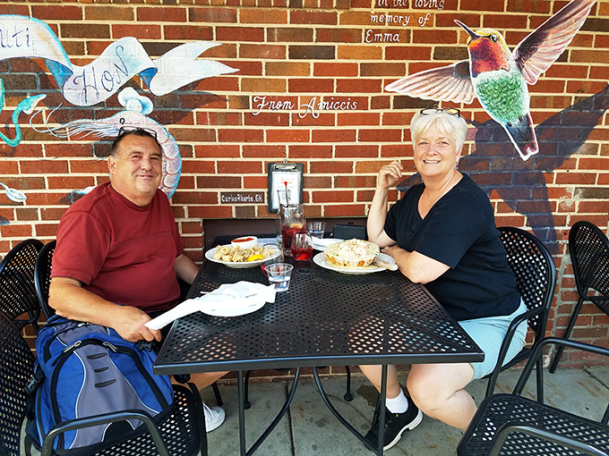 Happy diners enjoying the kind of meal that creates lasting memories and satisfied smiles.