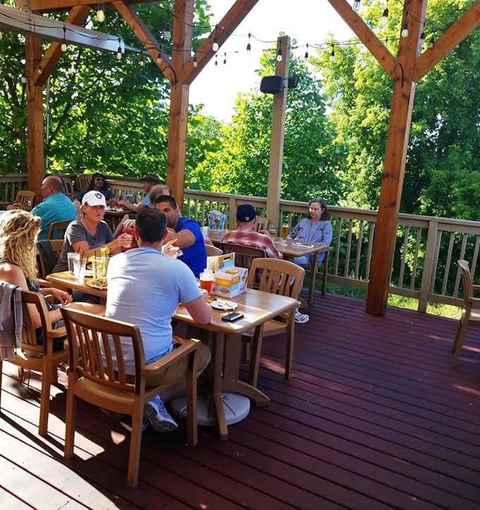 The outdoor dining area proves that fresh air makes everything taste better, especially when string lights create that magical "you're on vacation even if you're not" ambiance.