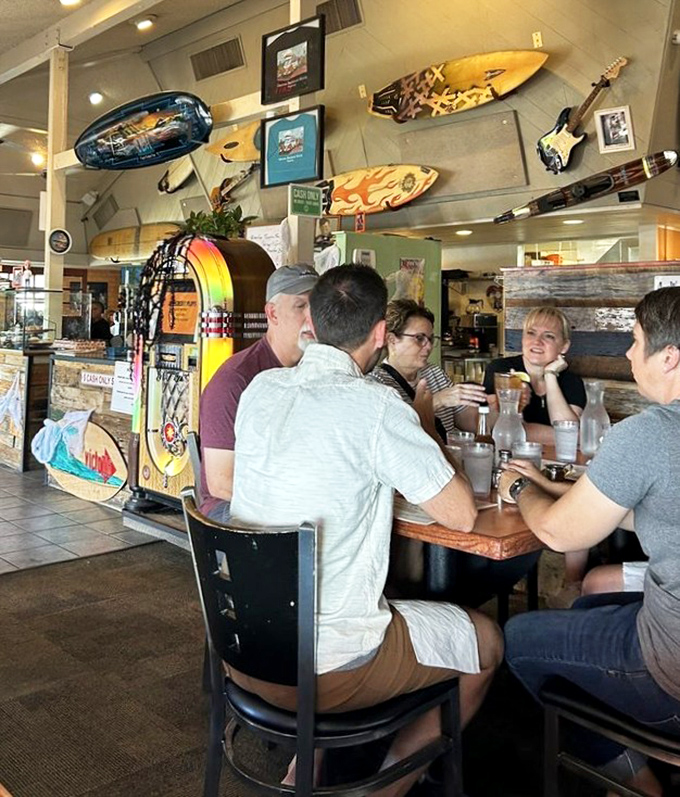 The true measure of a breakfast spot: happy people having conversations that matter, surrounded by surfboards in the Arizona desert.