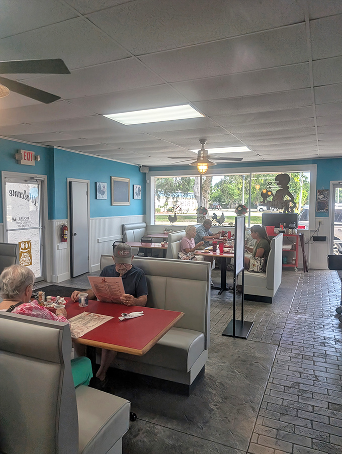 Booth seating where conversations flow as freely as the coffee, creating community one breakfast at a time.