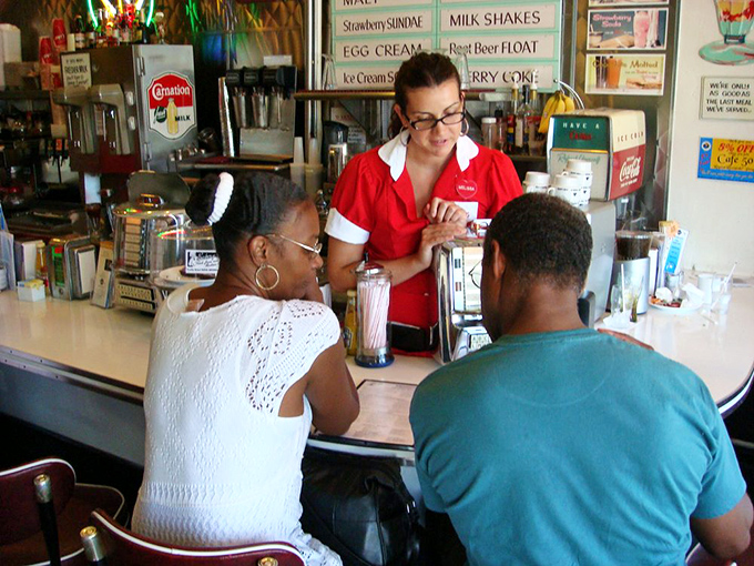 The counter isn't just where orders happen&mdash;it's where strangers become neighbors and servers become temporary therapists over coffee and conversation.