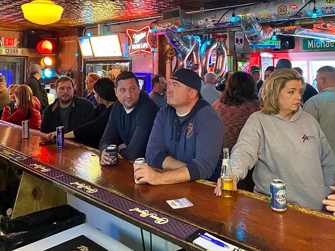 The bar on a busy night&mdash;where strangers become neighbors and neighbors become friends. Cold beer and warm conversation flow with equal abundance.