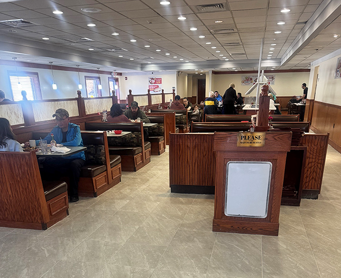 The wooden booths have witnessed countless first dates, family celebrations, and solo diners finding comfort in both food and familiar surroundings.