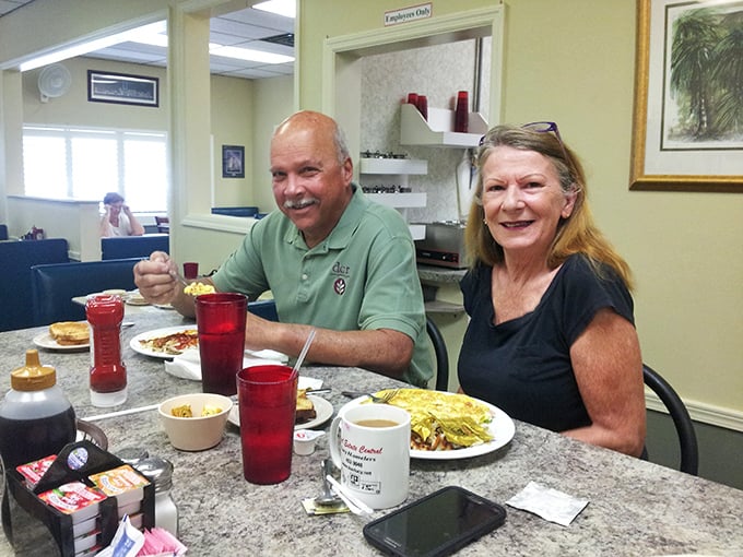 Happy diners with red cups and satisfied smiles&mdash;the universal language of "you need to try this place."