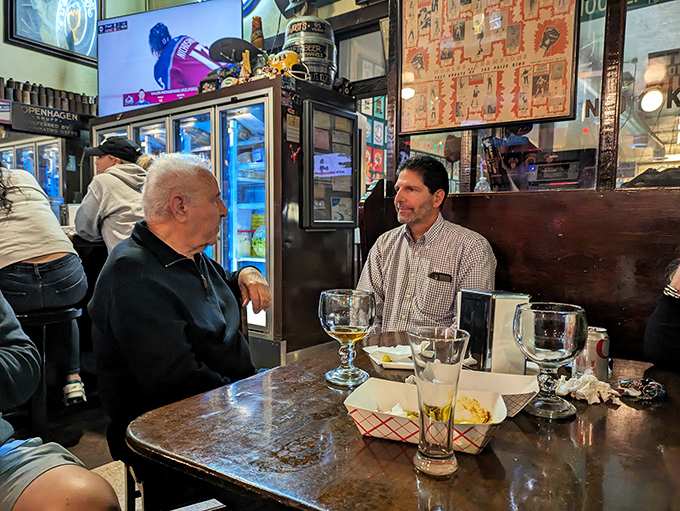 Conversations flow as freely as the beverages in this timeless gathering spot.