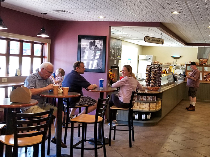 The café's interior buzzes with the quiet energy of people engaged in humanity's noblest pursuit: enjoying really good food together.