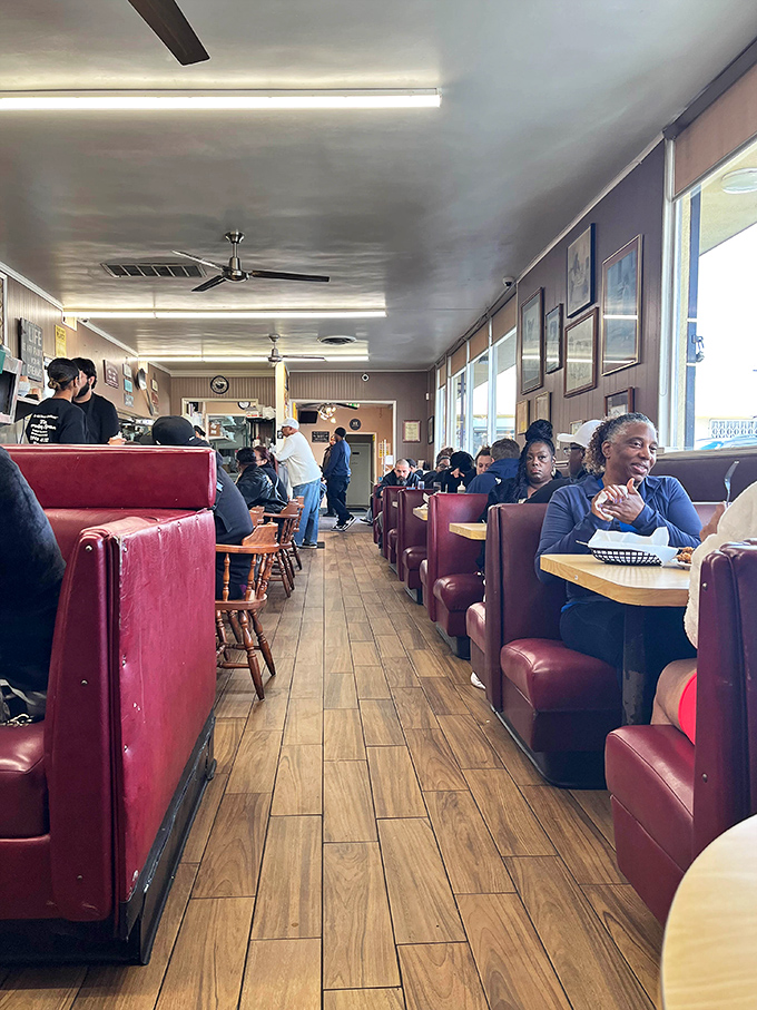 Regulars gather in familiar booths, creating the kind of community atmosphere that chain restaurants can't replicate.