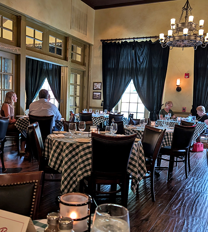 The dining room hums with conversation and clinking glasses, where memories are made between bites of exceptional food.