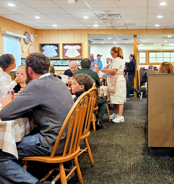 The dining room hums with the universal language of "mmm" as families gather around tables for meals worth remembering. No phones necessary&mdash;the food demands full attention. 