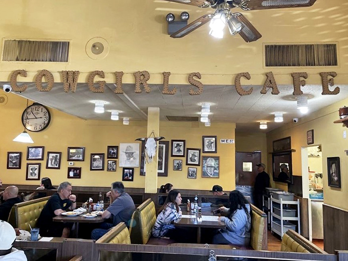 The dining room hums with the satisfied murmurs of regulars and first-timers alike. Those yellow booths have heard every "mmm" in the book.