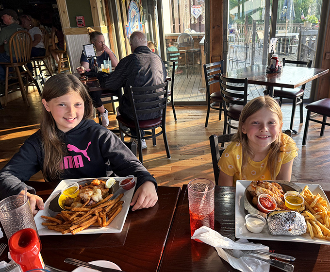 The universal language of satisfaction spoken fluently at every table in this welcoming space.