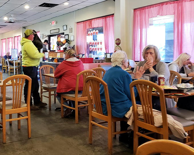 The dining room buzzes with conversation and laughter. Real community happens over eggs and coffee.