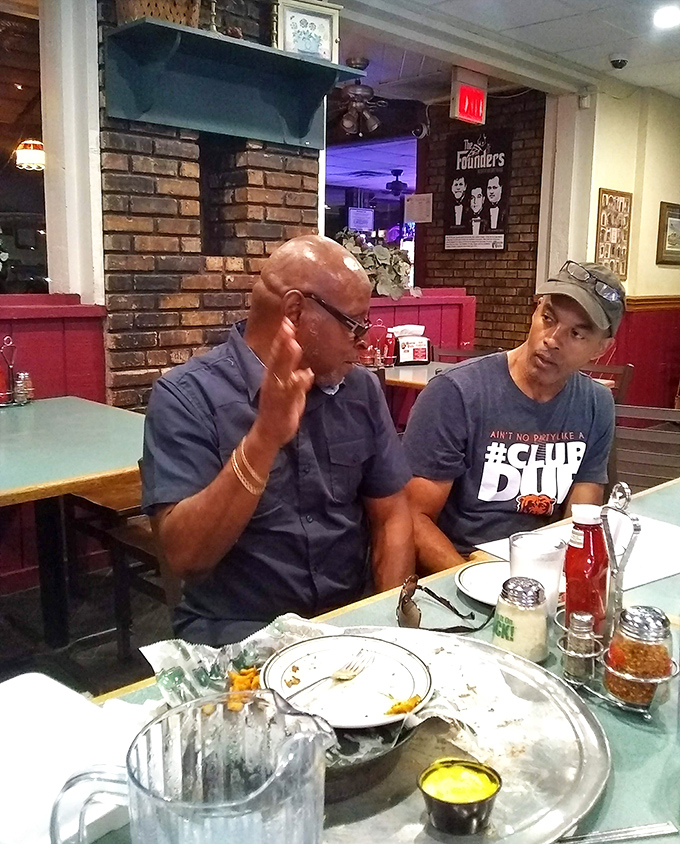 The brick walls and comfortable booths create the perfect backdrop for conversations that flow as easily as the refills.