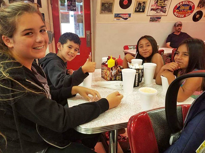 The diner brings families together around formica tables where memories are made between bites of comfort food and kids' thumbs-up reviews speak volumes.