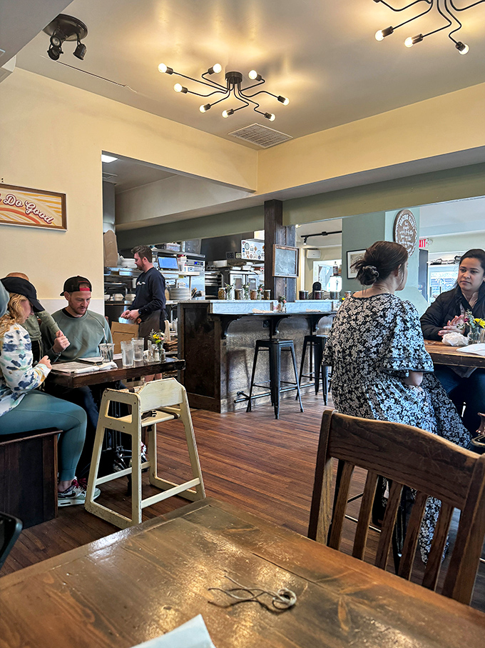 Happy diners lost in breakfast bliss—the universal language of "mmm" needs no translation when the food is this good.
