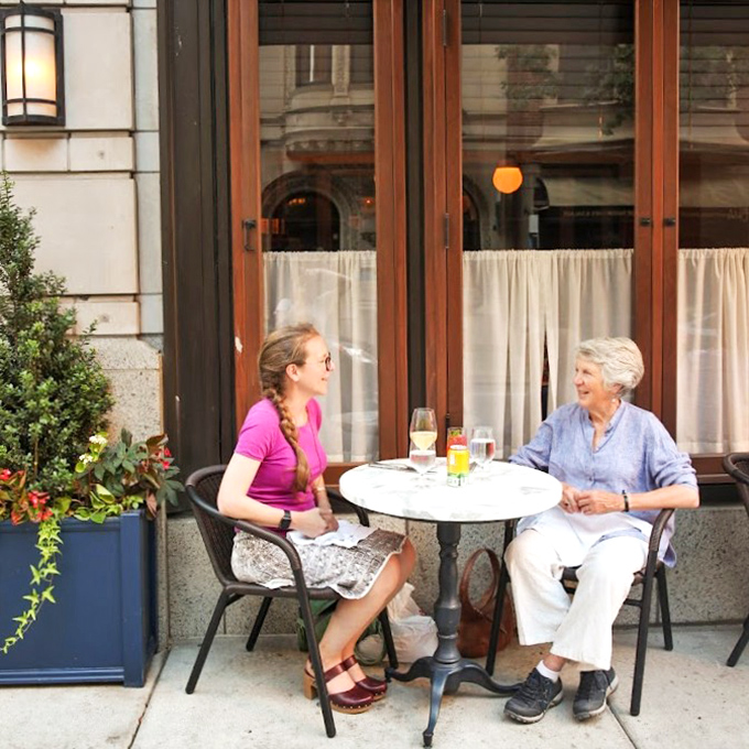 The sidewalk tables at The Love offer prime people-watching with a side of sunshine. Some conversations are simply better enjoyed outdoors.