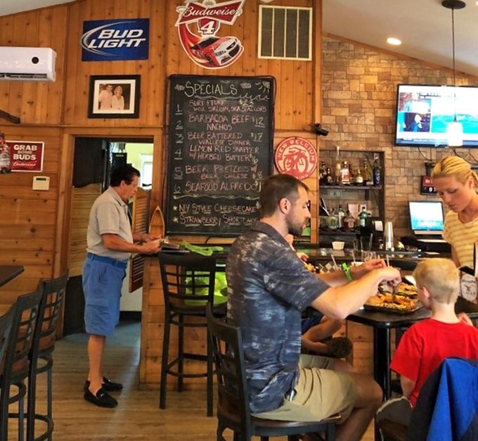 The chalkboard specials and wood-paneled walls create that classic Great Lakes tavern vibe where everyone feels like a regular.