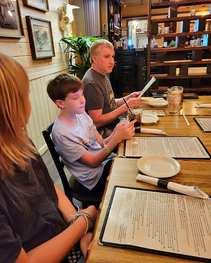 Family dining as it should be&mdash;menus big enough to hide behind while deciding whether to splurge on the bone-in ribeye. Spoiler alert: always yes.