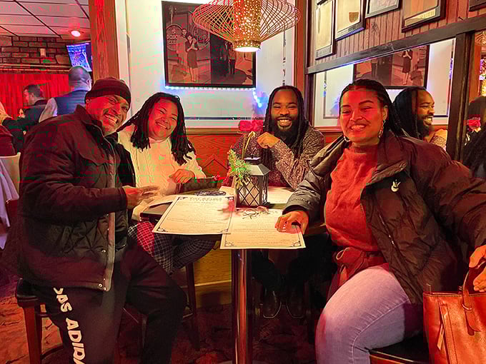 The neon glow makes everyone look like movie stars while they contemplate their next bite. This is where memories are made, one steak at a time.