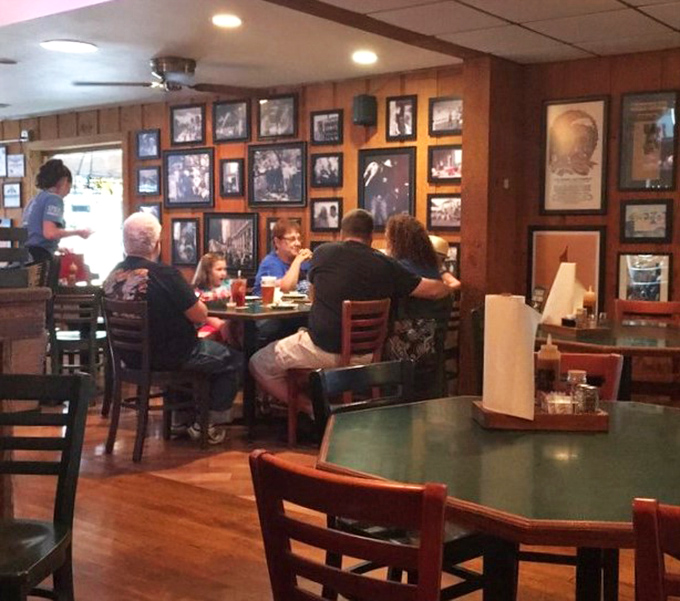 Where barbecue brings families together. Those wood-paneled walls have absorbed decades of satisfied "mmms" and "wows."
