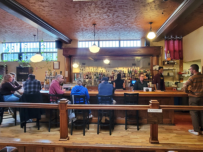 The bar at Alchemy isn't just where drinks are served&mdash;it's where strangers become friends and friends become family over craft beers.