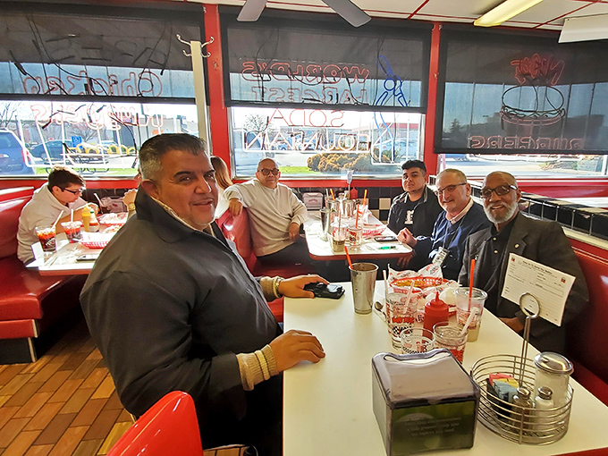 Every booth tells a story at Nifty Fifty's, where regulars become family and first-timers become regulars before the check arrives.