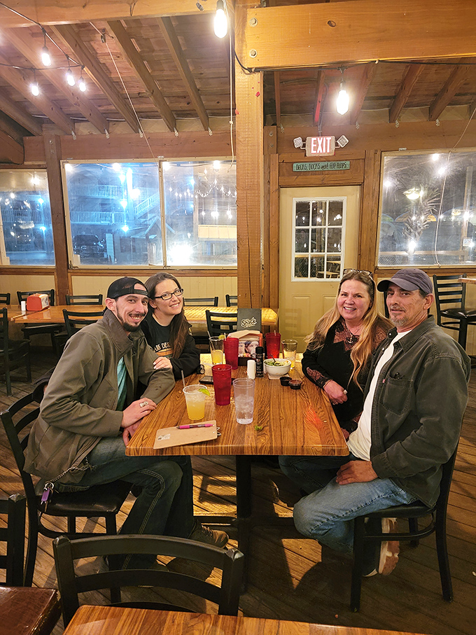 The best conversations happen over good food. These folks aren't just eating dinner; they're creating memories with a side of seafood.