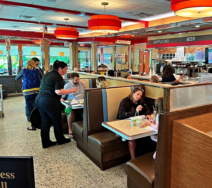 Where strangers become neighbors and servers become therapists. The booth-to-conversation ratio at Double T is scientifically perfect for human connection.