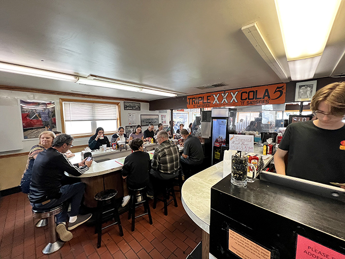 The counter at Triple XXX isn't just seating&mdash;it's front row tickets to the greatest show in West Lafayette: community happening over comfort food.