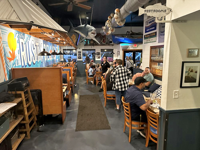 The dining room buzzes with the universal language of "mmm" as diners discover why locals keep this place packed year-round.