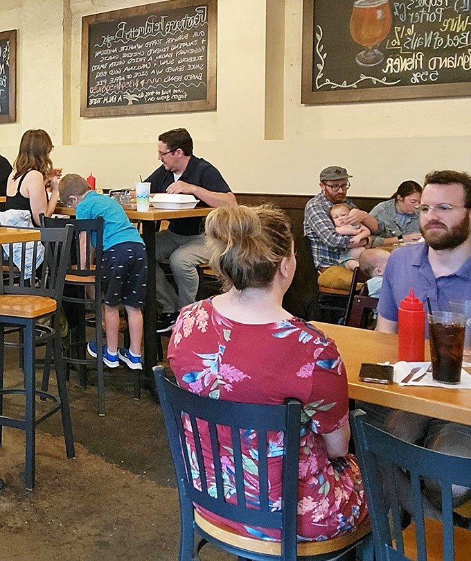 Happy diners discovering that sometimes the best meals happen in the most unexpected neighborhood spots.