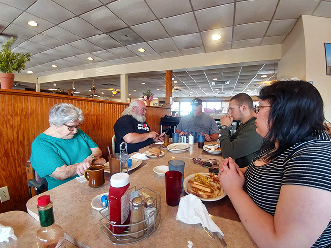 Where strangers become neighbors over bottomless coffee cups and conversations that flow as freely as the syrup.