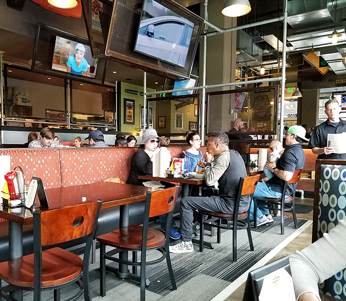 The dining room buzzes with the universal language of burger appreciation&mdash;where strangers become united in the pursuit of deliciousness.