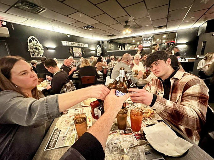The universal language of "cheers" transcends generations at tables where smartphones take a backseat to actual conversation.
