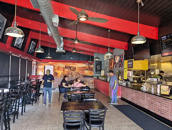 The dining room where strangers become friends united by the universal language of "mmmmm." No white tablecloths needed when the food speaks volumes.