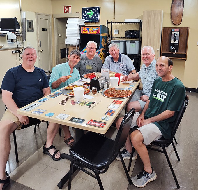 These gentlemen have probably consumed enough Rubino's pizza collectively to build a life-sized replica of Ohio Stadium—and they're still coming back for more.