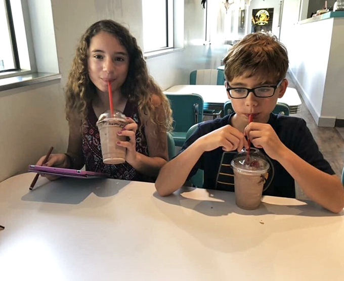 The milkshake summit: where important decisions are made, like whether chocolate or vanilla reigns supreme in the shake hierarchy.