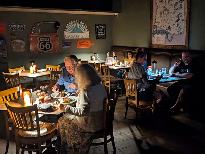 The warm glow of Edison bulbs creates the perfect backdrop for what matters most: good food, good company, and conversations that flow like wine.