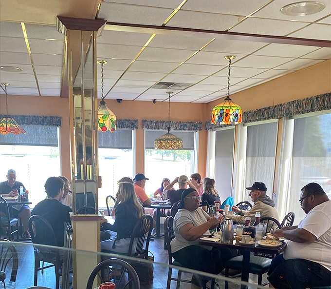 A snapshot of American life: diverse diners sharing the universal language of good food in a space where everyone belongs.