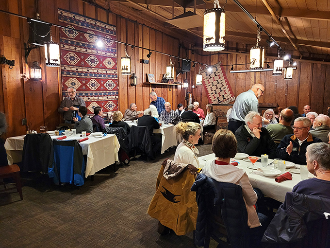 The dining room buzzes with conversation and clinking glasses – proof that good food brings people together better than any social media app.