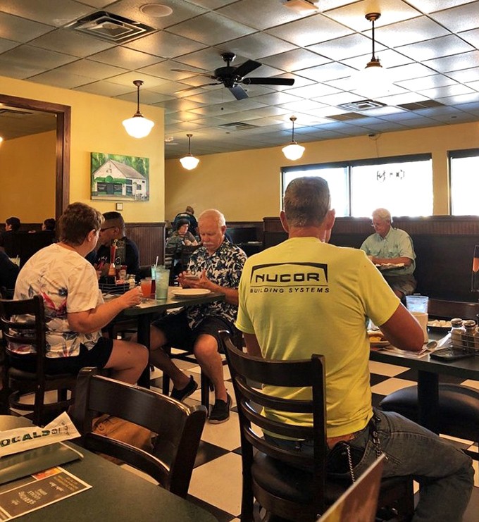 Where strangers become neighbors over coffee and conversation. Notice how nobody's looking at their phones? That's the Metro Diner magic.