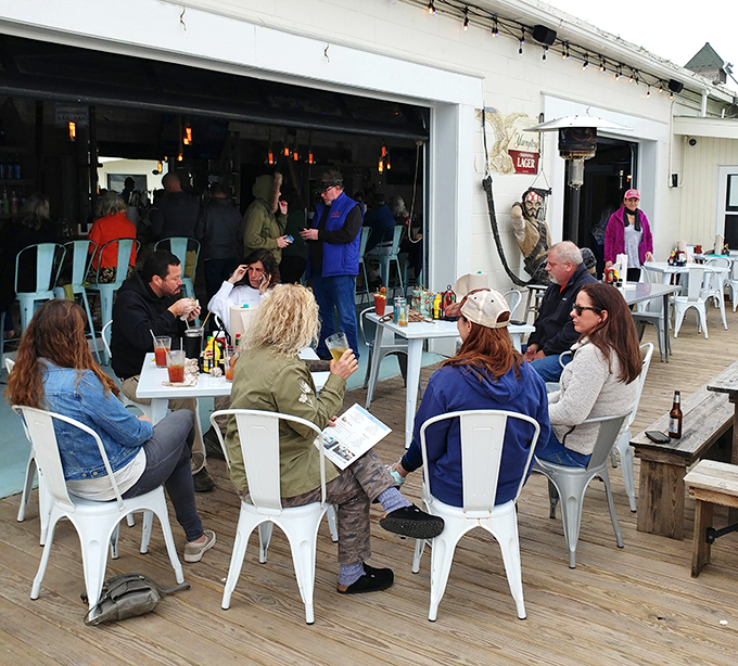 The outdoor seating area isn't just about the food&mdash;it's where strangers become friends over shared recommendations and Gulf breezes.