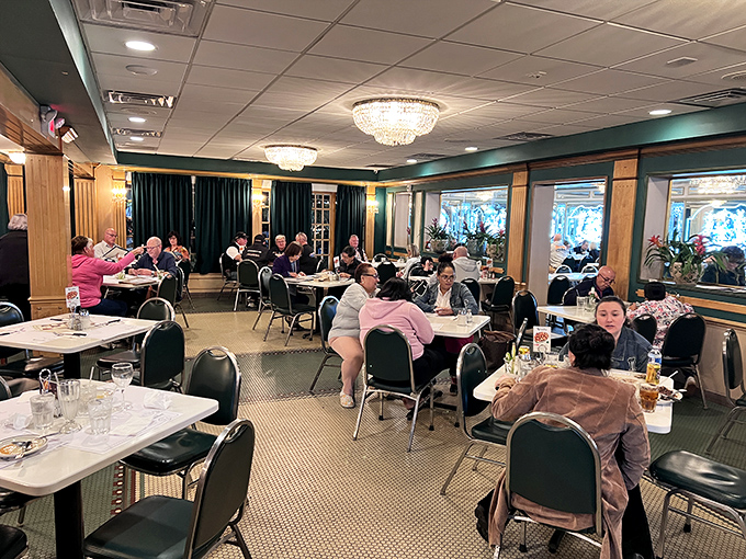 The dining room hums with conversation as locals and tourists alike gather for their Cuban food fix under sparkling chandeliers.