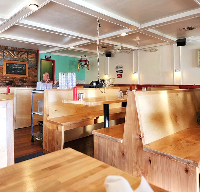 Wooden booths that have heard thousands of "Oh my god, you have to try this" conversations. The ceiling beams have witnessed countless breakfast epiphanies.