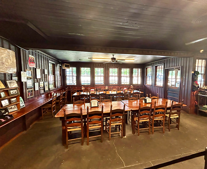 Empty chairs waiting for the next wave of pilgrims. The wood-paneled walls have absorbed decades of satisfied sighs.