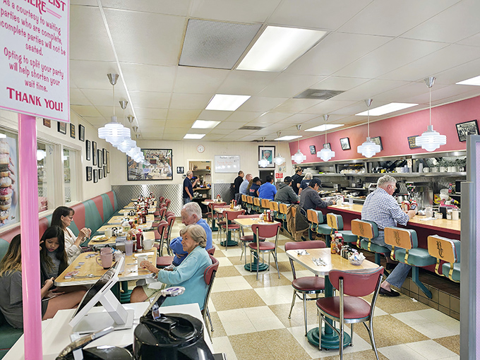 The classic diner interior with its pink walls, pendant lights, and checkered floor isn't retro by design&mdash;it's authentic by survival.