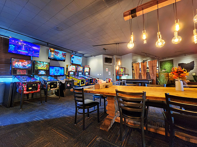 The arcade area proves that Homestead understands a fundamental truth: food tastes better when there's the promise of pinball afterward.