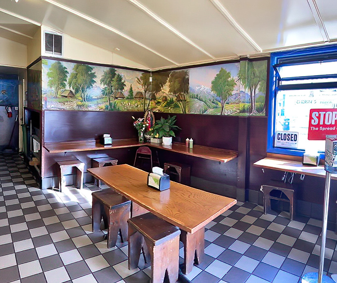 Where strangers become friends over shared food revelations. These wooden tables have witnessed countless first-bite epiphanies.